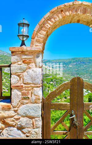 A scenic view of the tranquil Iron Gate river surrounded by evergreen ...