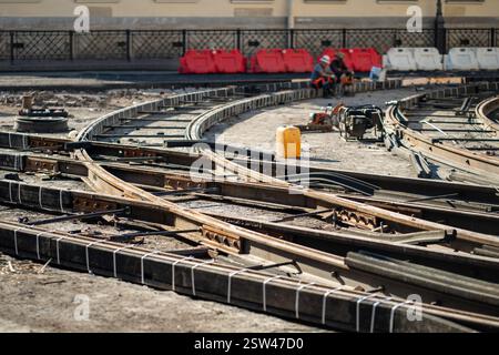 Major tram track overhaul on closed city street. Rail junction with ...
