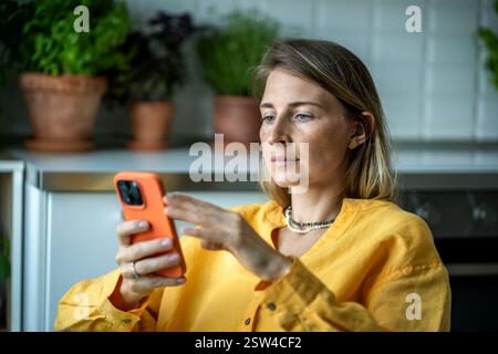 Woman look at cellphone screen read great news feels happy Stock Photo ...