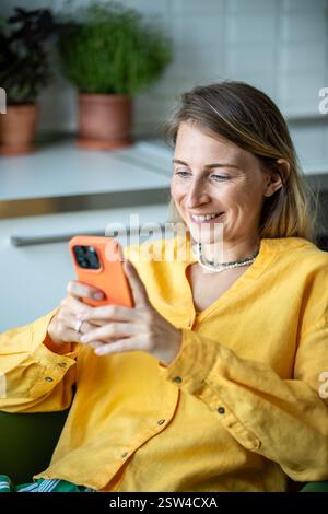 Pleased woman spending weekend at home Stock Photo - Alamy