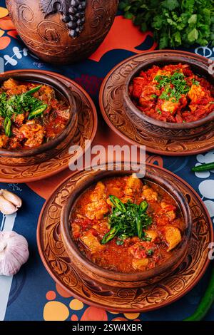 Traditional clay pot stews with fresh herbs Stock Photo - Alamy