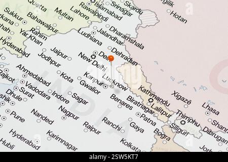 Close up to a Lucknow city with an orange pin needle into India country ...