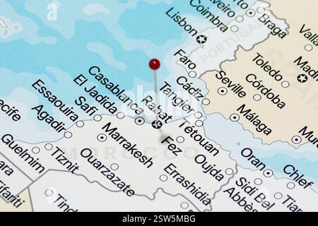 red pin needle into rabat city of morocco political map Stock Photo - Alamy