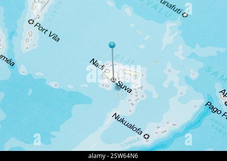 Close up to a Suva city with a blue light pin needle into Fiji country ...