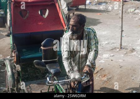 Bangladeshi cycling rickshaw hard work in Bangladesh poor people Stock ...