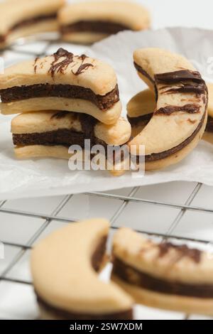 Moon shape gingerbread cookie close up on a white background Stock ...