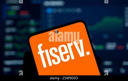 Dhaka, Bangladesh- 31 Oct 2024: Fiserv logo is displayed on smartphone ...