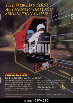 Video arcade driving race cars Stock Photo - Alamy