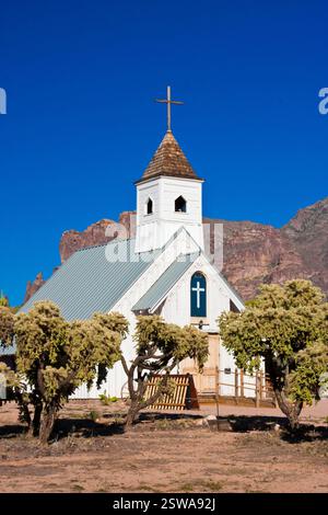 Beautiful small church surrounded by trees and flower garden Stock ...