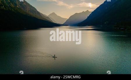 Exploring the serene beauty of Plansee in Austria during golden hour ...
