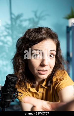 POV of social media star using smartphone camera to capture welcoming ...