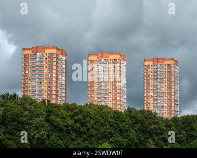 New high-rise buildings on a green hill. Moscow Stock Photo - Alamy