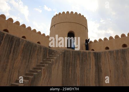 Dibba Al Baya. 21st Feb, 2025. An Omani man in traditional attire ...