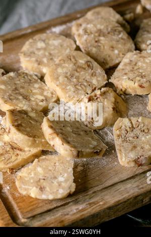 the process of making biscuits, shortbread dough raw, cut shape, sweet ...