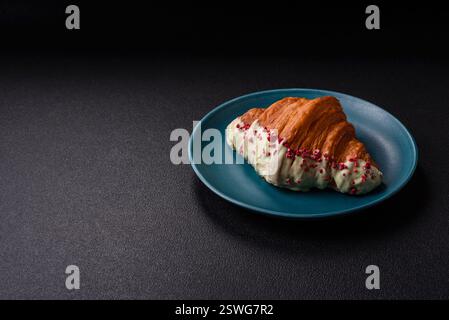 Crispy sweet red croissant with pistachio, raspberry and strawberry ...