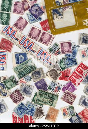 flat lay of a collection of vintage stamps from the united states of ...