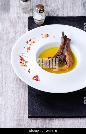 Well done grilled lamb chop Stock Photo - Alamy