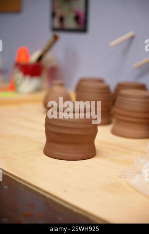 Pottery handmade on a wooden surface Stock Photo - Alamy