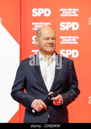German Chancellor Olaf Scholz (L) attends the G20 leaders summit closes ...