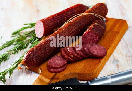 Russian dry smoked sausage with rosemary Stock Photo - Alamy