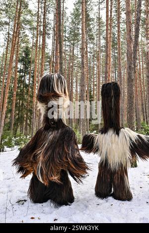 Traditional Kukeri performers dressed in thick long hair goat fur ...