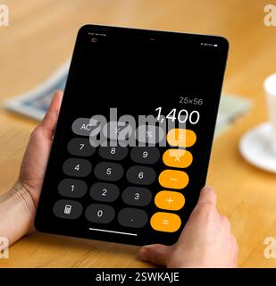 Calculator app on an iPad Stock Photo - Alamy