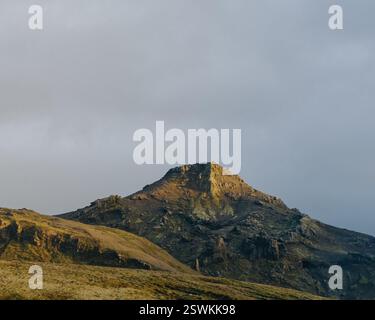 The view of a field with a mountain hidden in the fog. Iceland Stock ...