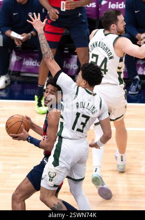 Milwaukee Bucks guard Ryan Rollins (13) moves the ball during the first ...