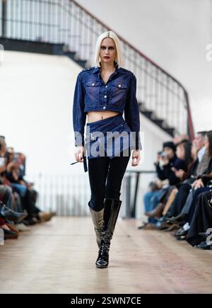 Model walks on the runway at the Mark Fast fashion show during Fall ...