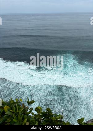 Powerful foamy sea waves rolling and splashing over water surface ...