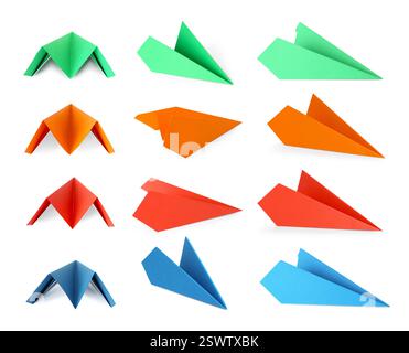 Red and green paper planes on pink background Stock Photo - Alamy