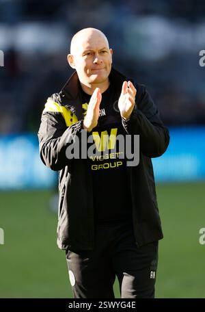 Millwall manager Alex Neil applauds the traveling fans after his sides ...