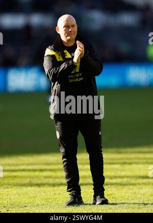 Millwall manager Alex Neil applauds the traveling fans after his sides ...