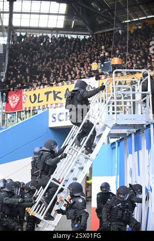 Rostock, Germany. 22nd Feb, 2025. Fans of FC Hansa Rostock stand in ...