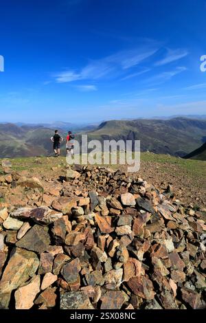 Walkers on the summit of Red Pike fell above Buttermere, Lake District ...