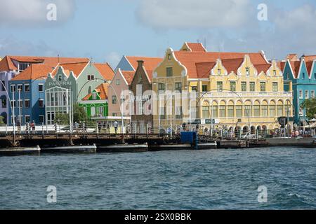 The Queen Emma Bridge is a floating pontoon bridge that connects the ...