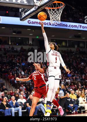 South Carolina guard Maddy McDaniel (1) drives past UConn guard KK ...
