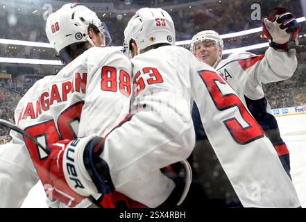 Washington Capitals center Ethen Frank (53) celebrates with Dylan ...