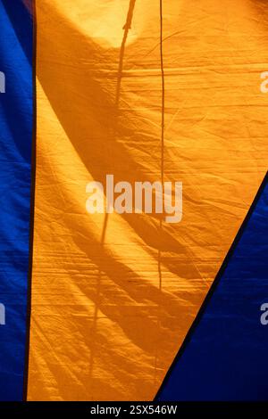 Colorful texture of old circus tent forming yellow and oranges graphic ...