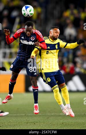 New England Revolution midfielder Alhassan Yusuf, left, and Toronto FC ...