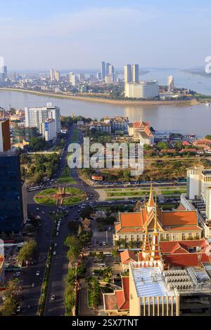 Aerial view of Tonle Sap river with modern buildings and a bustling ...