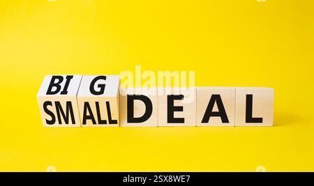 Big deal and small deal symbol. Turned cubes with words Big deal and ...