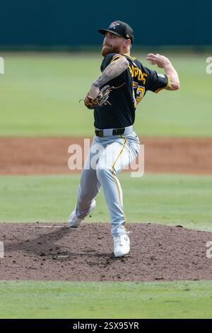 Pittsburgh Pirates pitcher Mike Burrows walks off the field after being ...