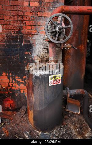 Valves, pipes and pumps on a coke oven by product plant. Chemical works ...