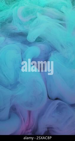 Swirls of bright blue fume Stock Photo - Alamy