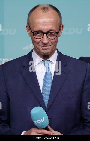 Friedrich Merz, leader of the Christian Democratic Union (CDU), looks on during a press ...