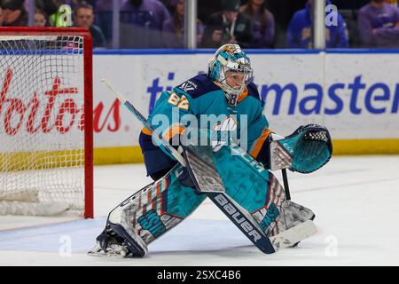 New York Sirens goaltender Kayle Osborne (82) watches the puck as ...