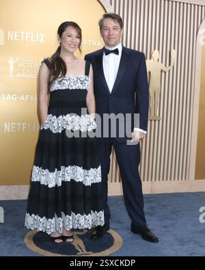 Sean Baker, left, and Samantha Quan arrive at the Vanity Fair Oscar ...