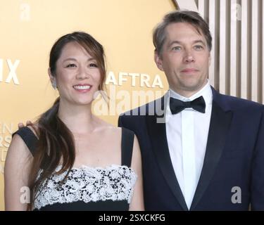 Sean Baker, left, and Samantha Quan arrive at the Vanity Fair Oscar ...