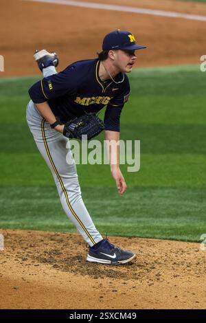 February 23, 2025: Wolverine pitcher David Lally Jr. (5) releases the ...